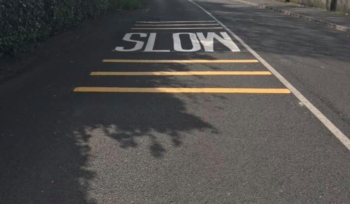 'Slow' road markings painted onto Brownshill Road as part of traffic ...
